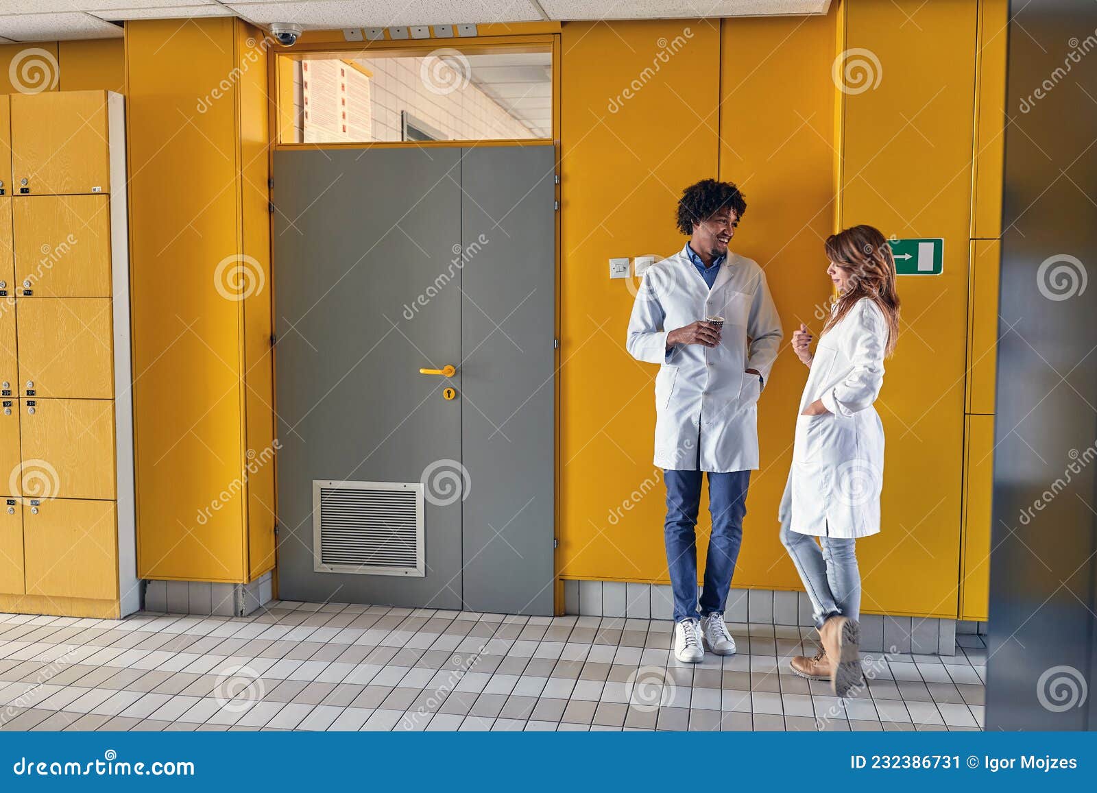 Medical Workers Chatting in Front Laboratory Stock Image - Image of ...