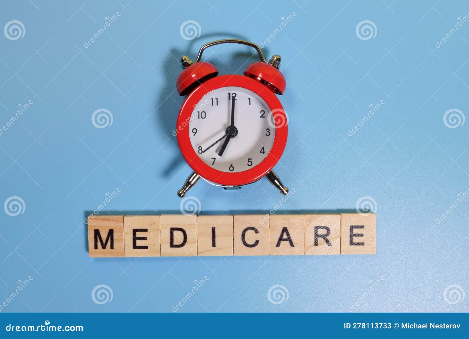 Medicare Word and Alarm Clock on Blue Background Stock Image - Image of ...
