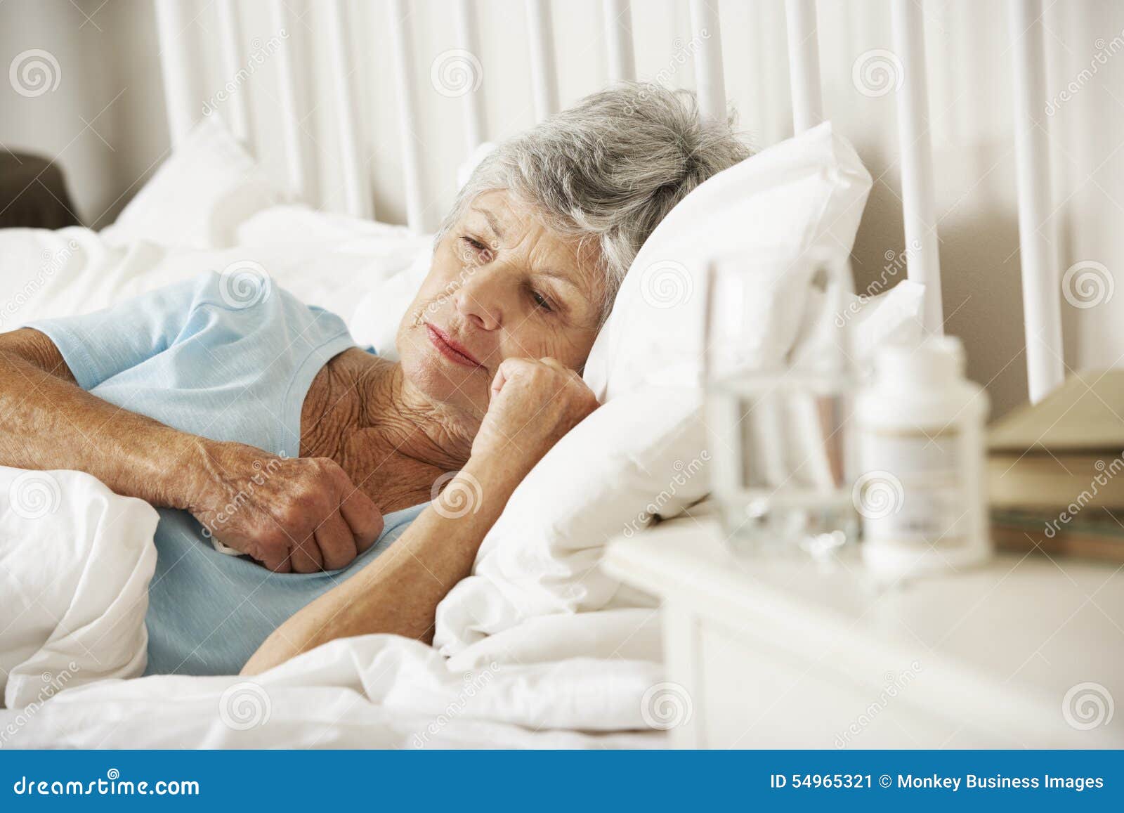 Medication on Bedside Table of Sleepless Senior Woman Stock Image ...