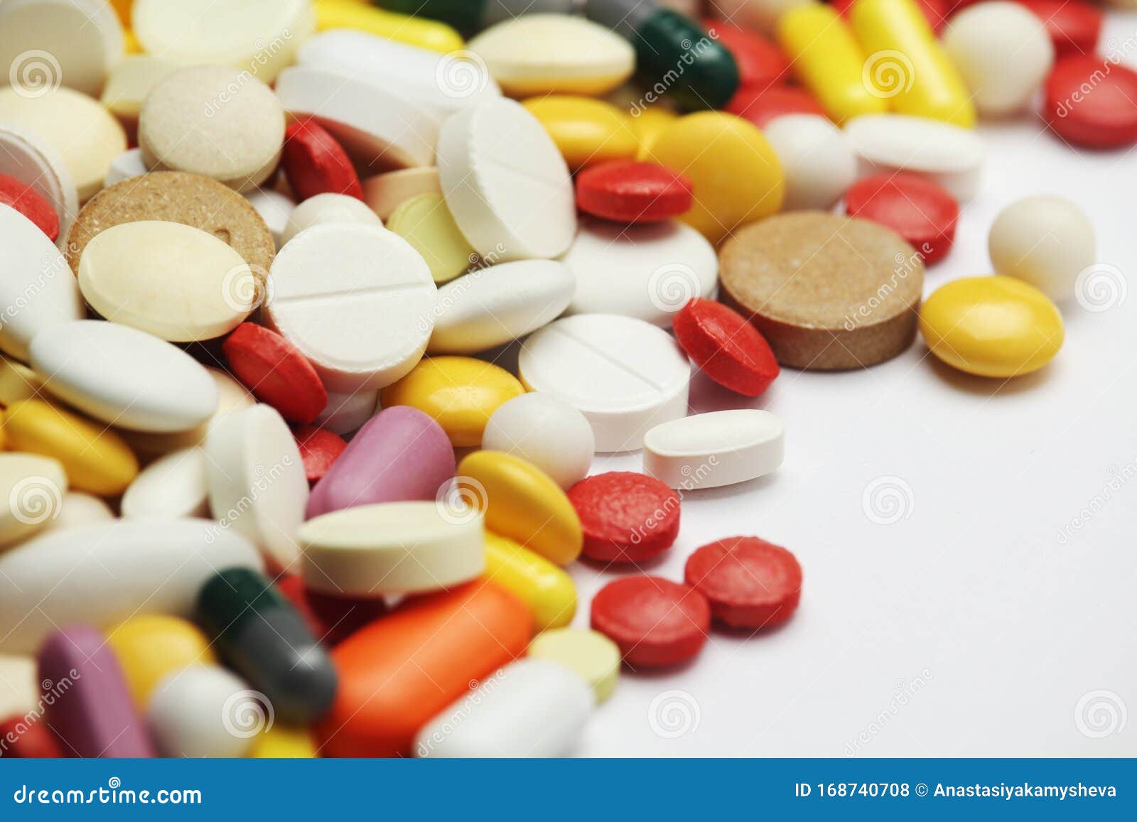 Different Colorful Tablets at White Background Stock Photo - Image of ...