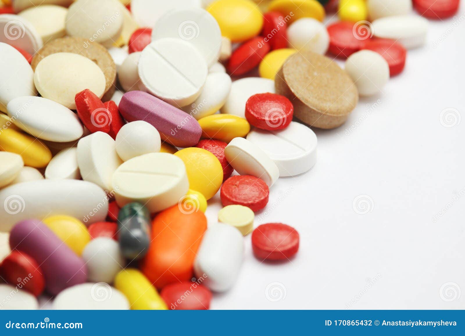 Different Colorful Tablets at White Background Stock Photo - Image of ...