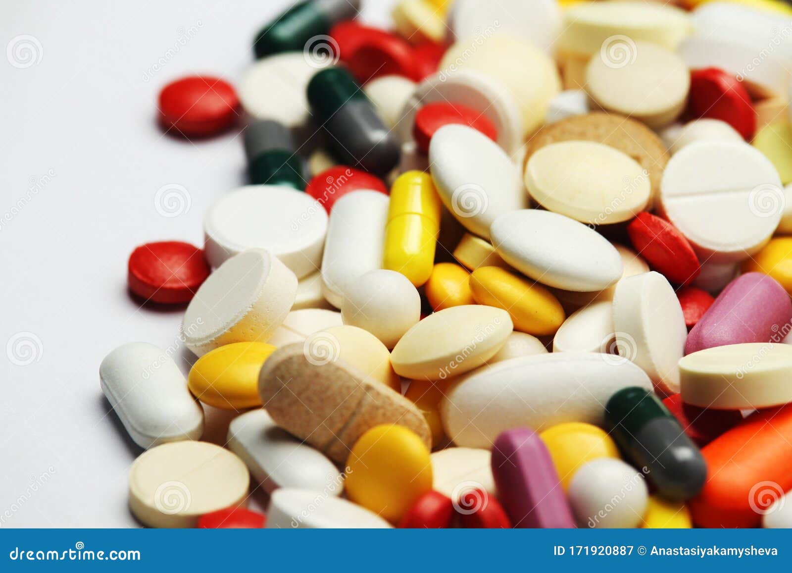 Different Colorful Tablets at White Background Stock Image - Image of ...