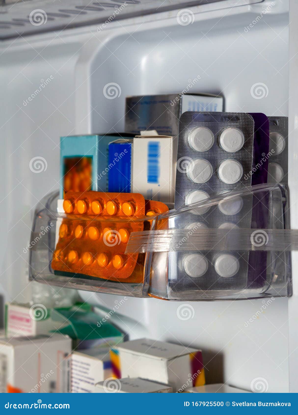 Medications are Placed on the Shelves of the Refrigerator for Storage ...