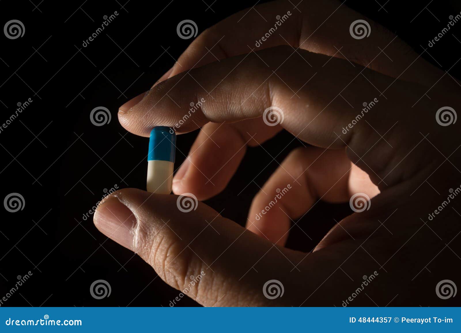 Medicine capsule in hand. stock image. Image of supplement - 48444357
