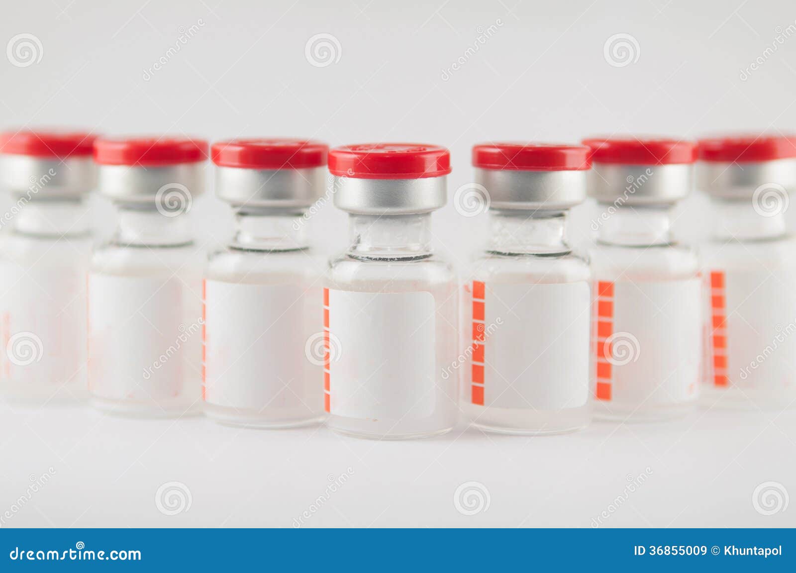 Injection Vial, Syringe And Alcohol Pad For Disinfection On A White ...