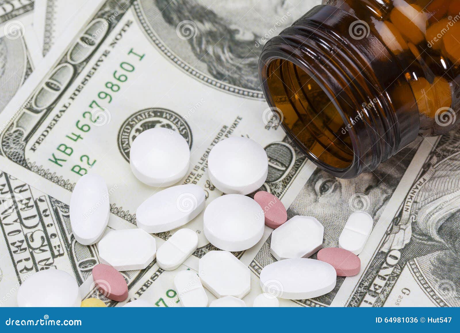 Medicine tablets on money stock photo. Image of container - 64981036