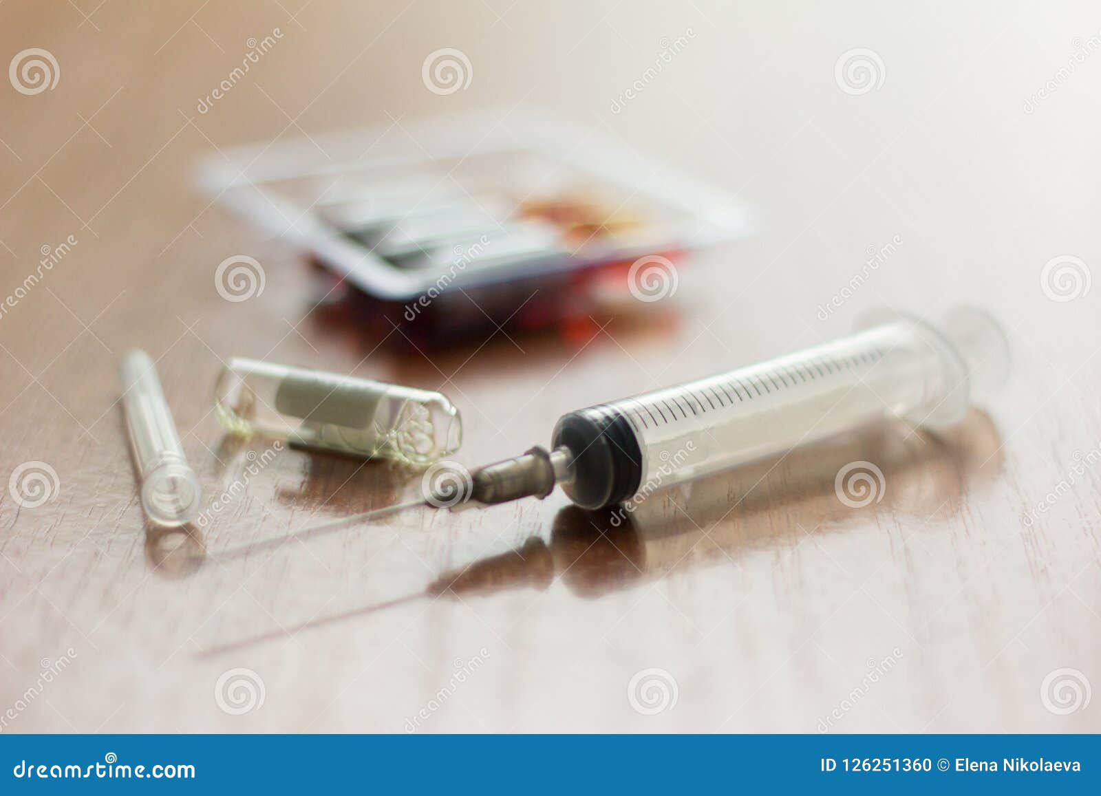 Medicines, Injectable Ampoules and Syringe on the Table Stock Photo ...