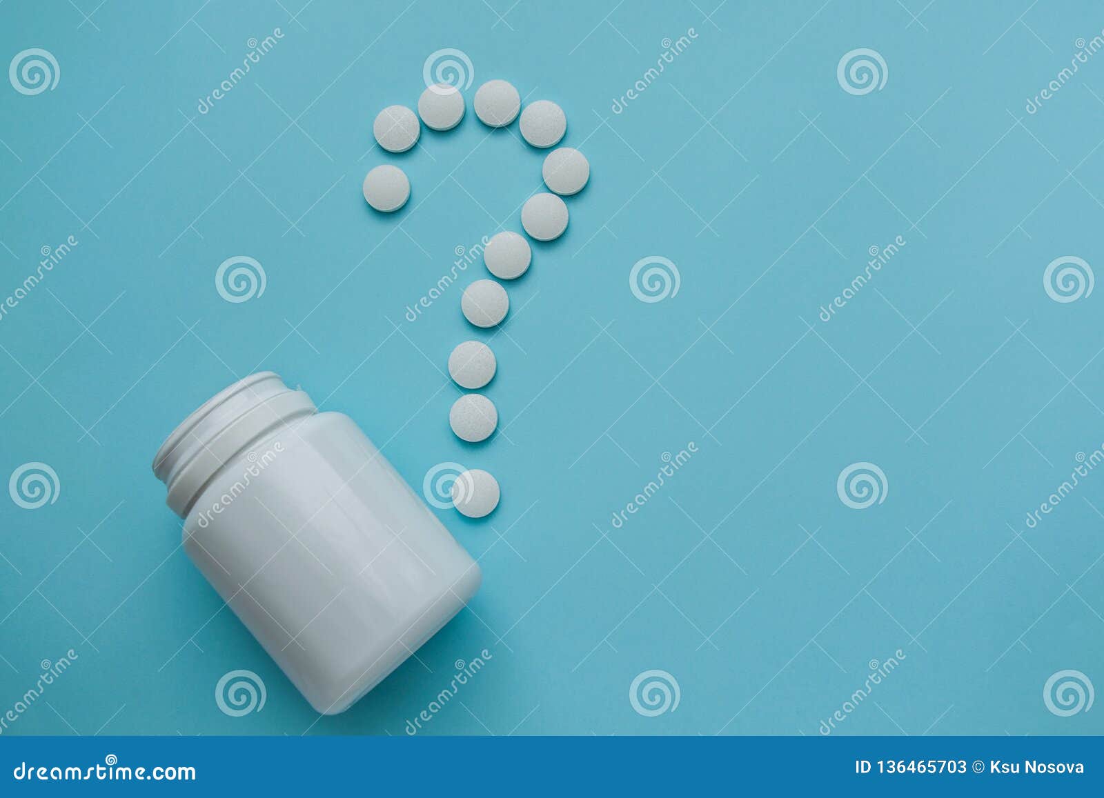 Medicines White Round Heart Shaped Pills On Blue Background Stock