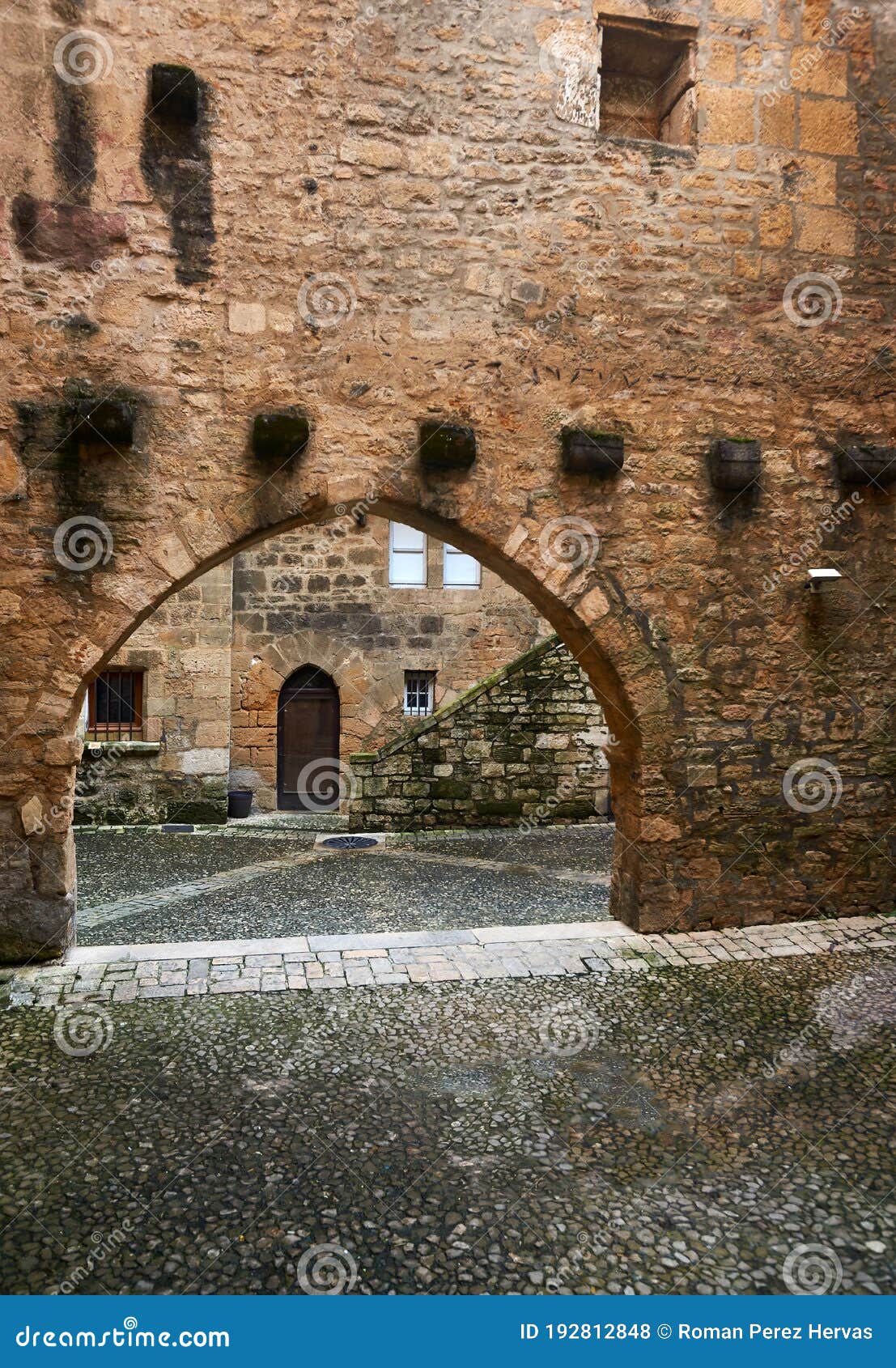 Medieval Arched Entrance in a Stone Wall Stock Photo - Image of street ... Medieval Arched Entrance in a Stone Wall Stock Photo - Image of street ...