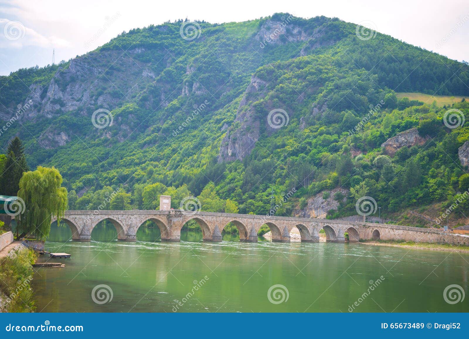 Medieval bridge on a river stock image. Image of nature - 65673489
