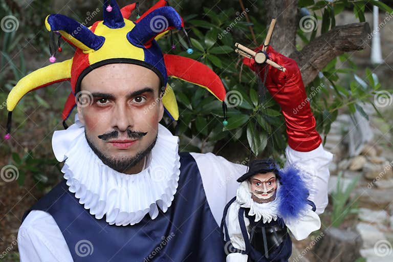 Medieval Buffoon with a Puppet Stock Photo - Image of comedian ...