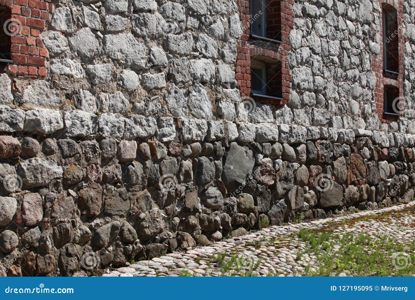 Medieval city stone wall stock image. Image of window - 127195095
