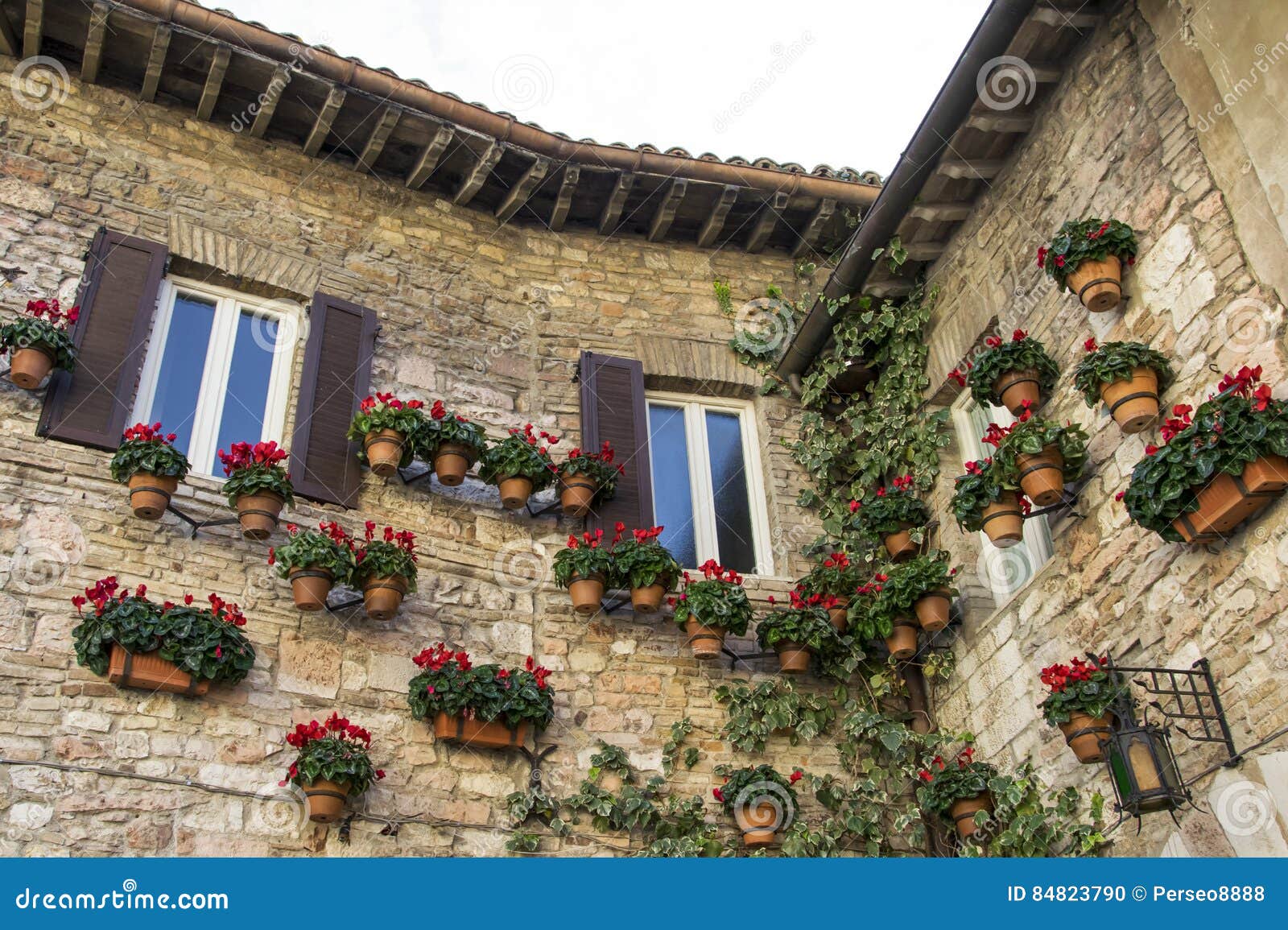 Medieval Corner with Flower and Pots. Stock Photo - Image of historic ...