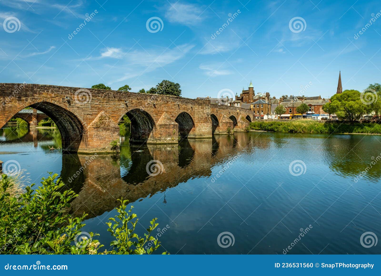 The Medieval Devorgilla Bridge, Reflecting on the River Nith Stock ...