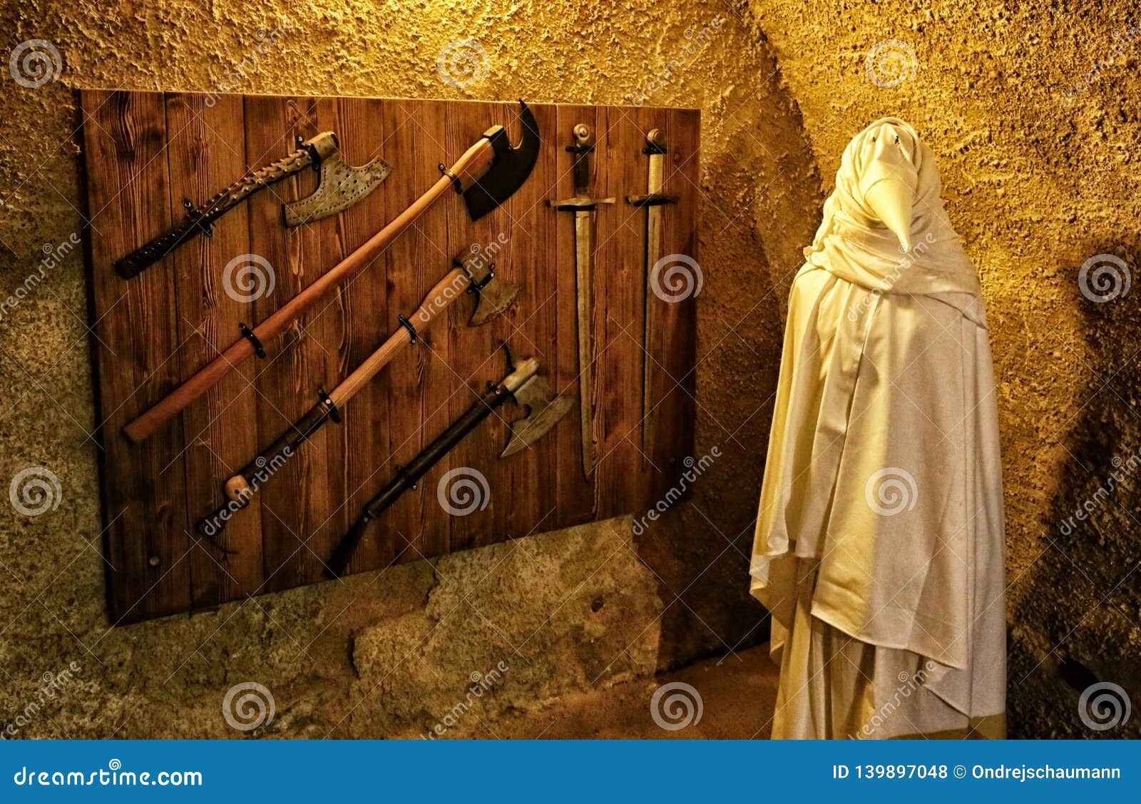 Medieval Executioner Mask and Board with Axes and Swords Editorial ...