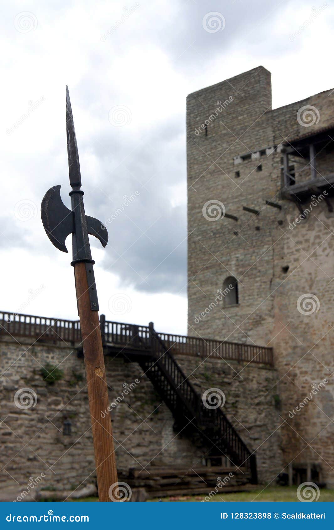 Medieval Halberdpike in Front of the Castle Wall and Cloudy Sky ...