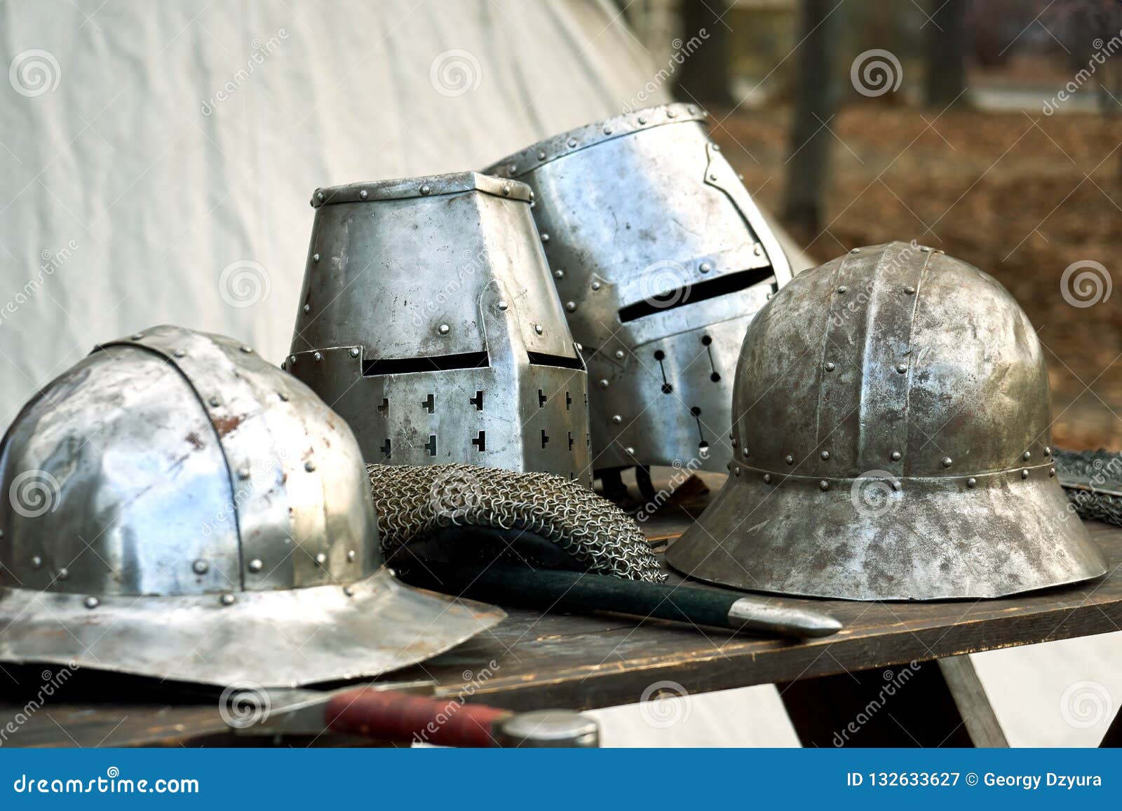 Medieval Helmets with Eyes Slits Standing on the Table Stock Image ...