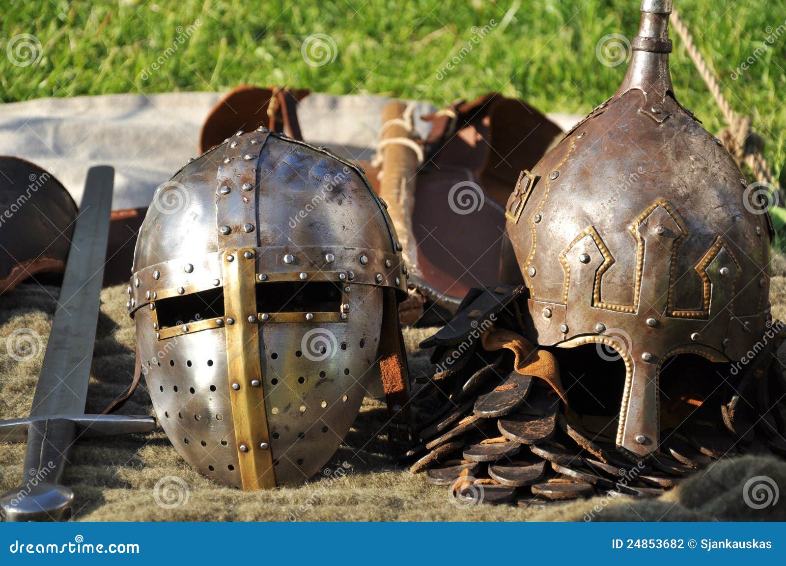 Medieval helmets and sword stock photo. Image of helm - 24853682