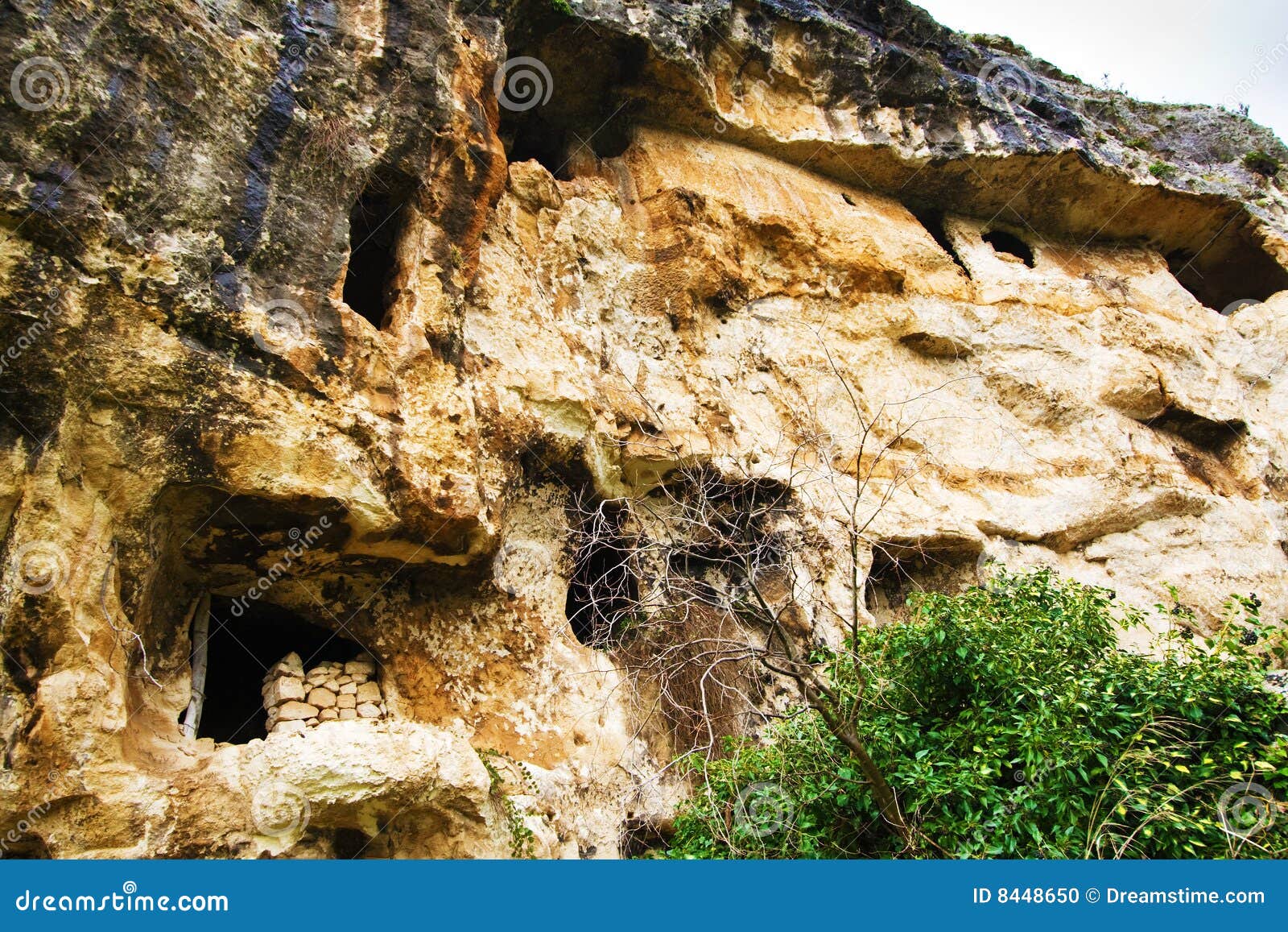 Medieval home in the rock stock photo. Image of location - 8448650