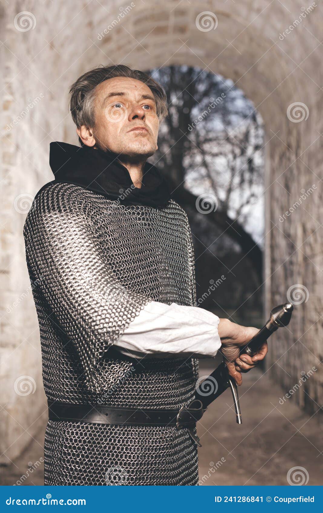 Armed Man in Chain Armor with Sword Serving As Guard on Castle Gateway ...