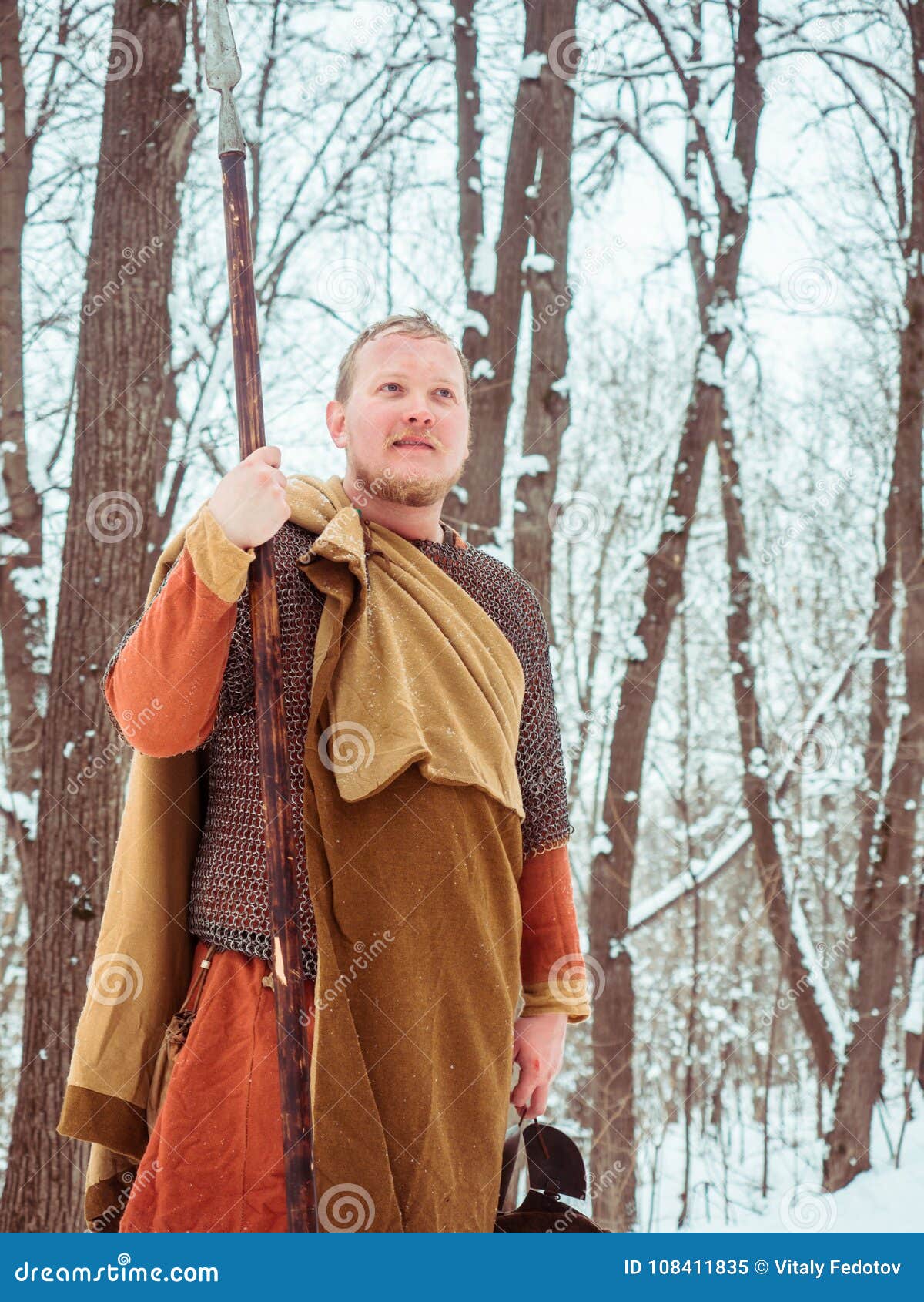 Medieval Irish Warrior in Chain Mail and Helmet Holds a Spear in the ...