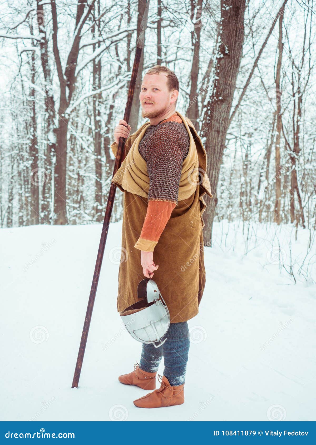 Medieval Irish Warrior in Chain Mail and Helmet Holds a Spear in the ...