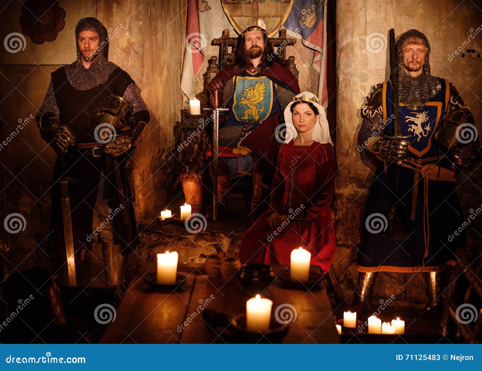 Medieval King with His Queen and Knights on Guard in Castle Interior ...