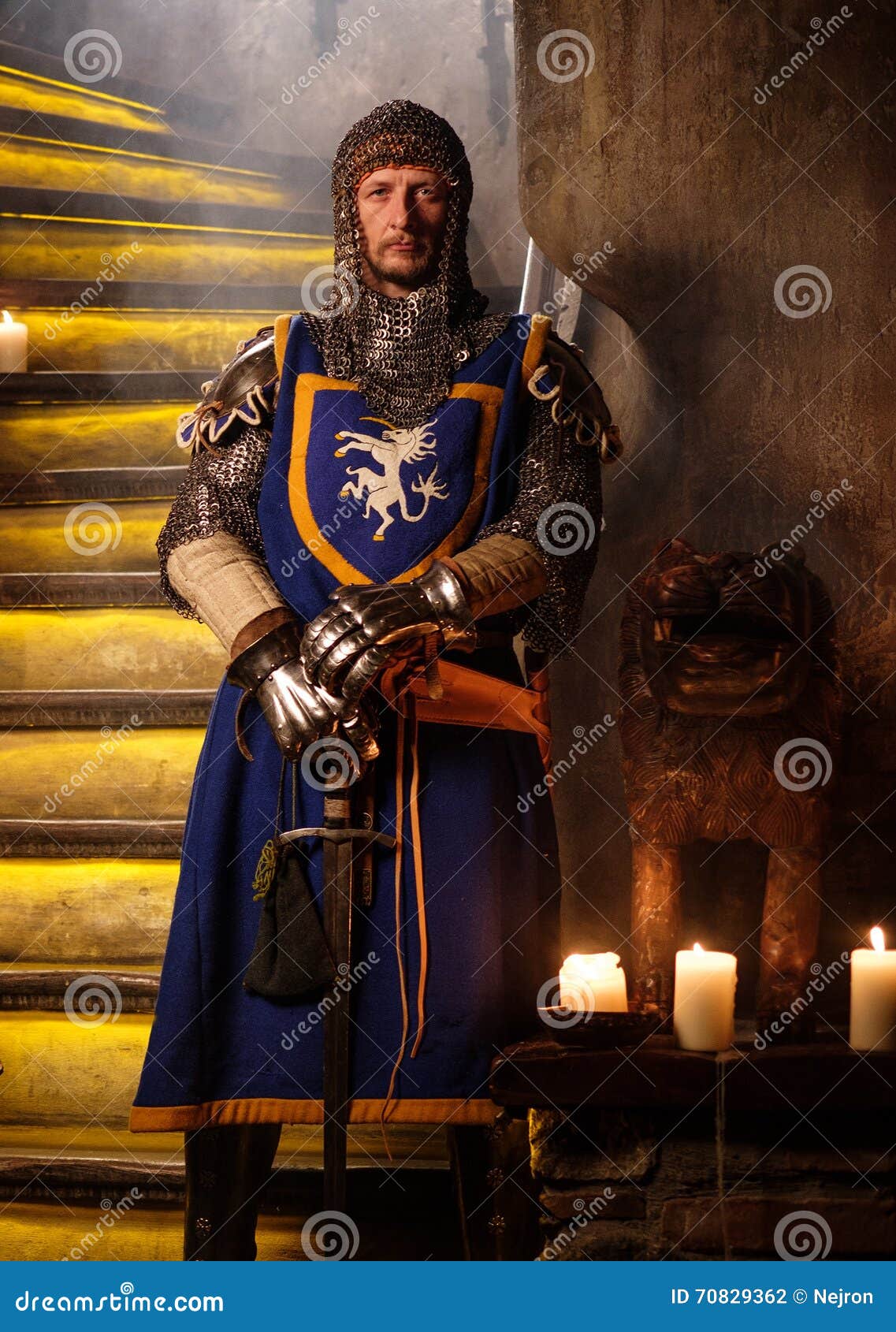 Medieval Knight on Guard in Ancient Castle Interior. Stock Photo ...