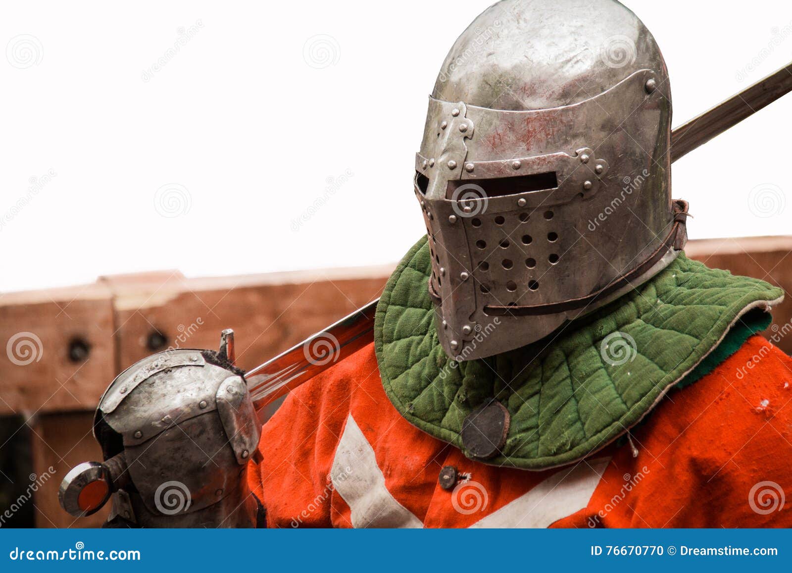 Medieval Knight in Helmet with Sword Stock Photo - Image of lowered ...