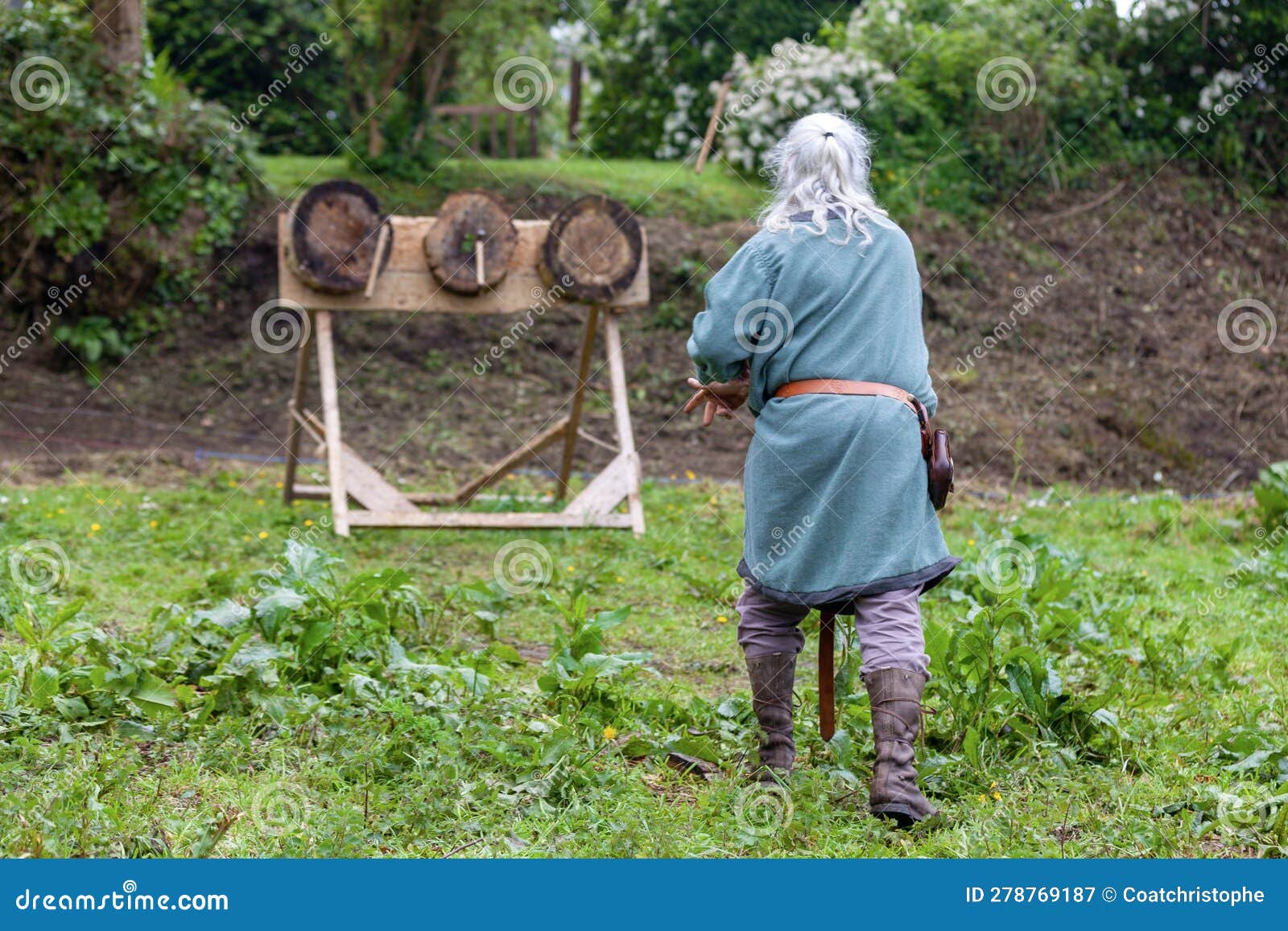 Medieval Man Practicing Axe Throwing Stock Image - Image of brittany ...