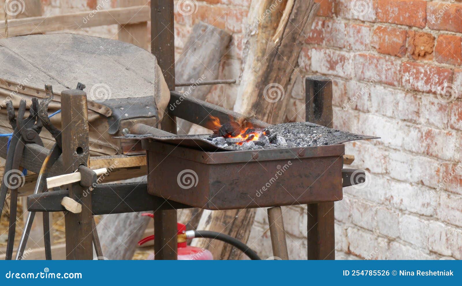Medieval Method of Forging Iron, the Blacksmith Forges an Iron Nail ...