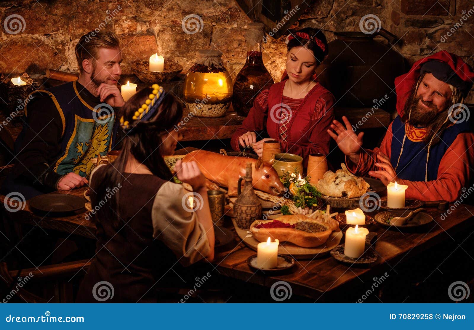Medieval People Eat and Drink in Ancient Castle Kitchen Interior. Stock ...