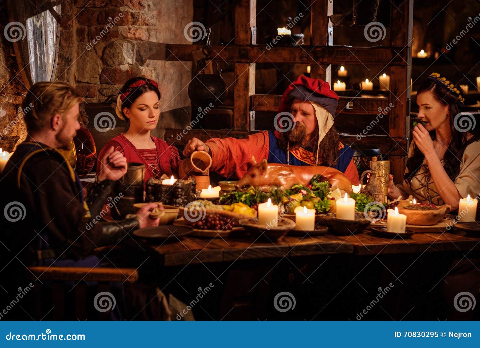 Medieval People Eat and Drink in Ancient Castle Kitchen Interior. Stock ...
