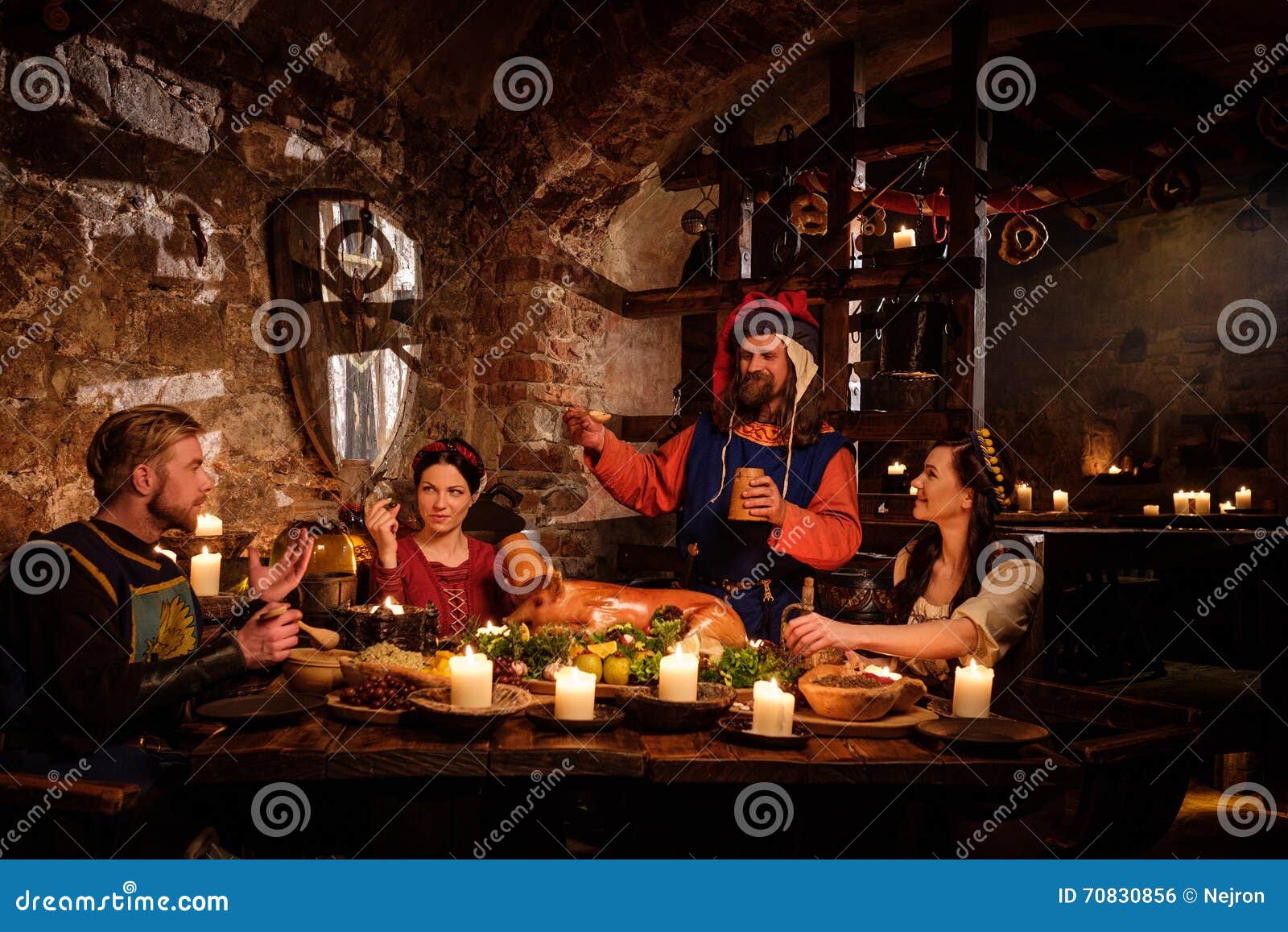 Medieval People Eat and Drink in Ancient Castle Kitchen Interior. Stock ...