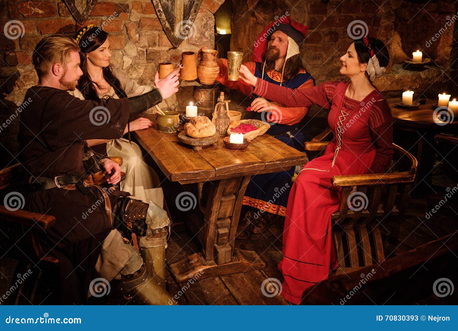 Medieval People Eat and Drink in Ancient Castle Tavern. Stock Image ...