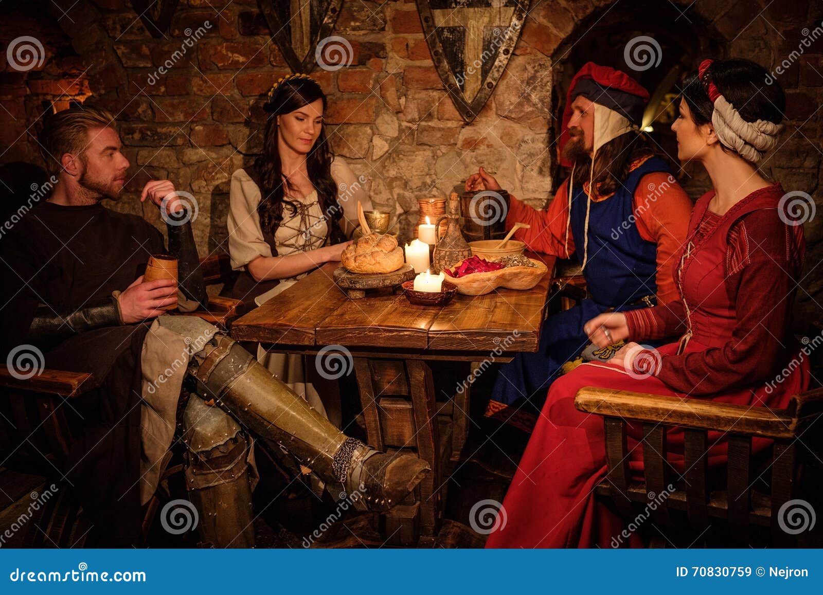 Medieval People Eat and Drink in Ancient Castle Tavern. Stock Image ...