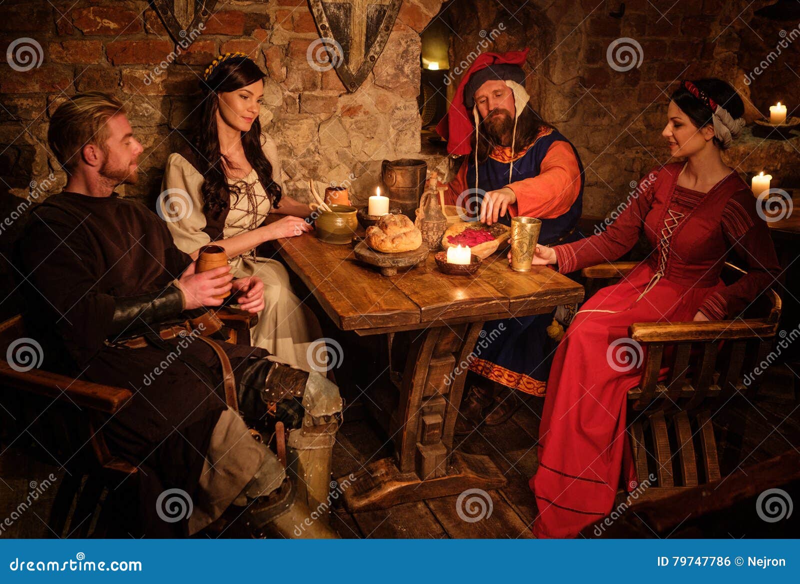 Medieval People Eat and Drink in Ancient Castle Tavern Stock Photo ...