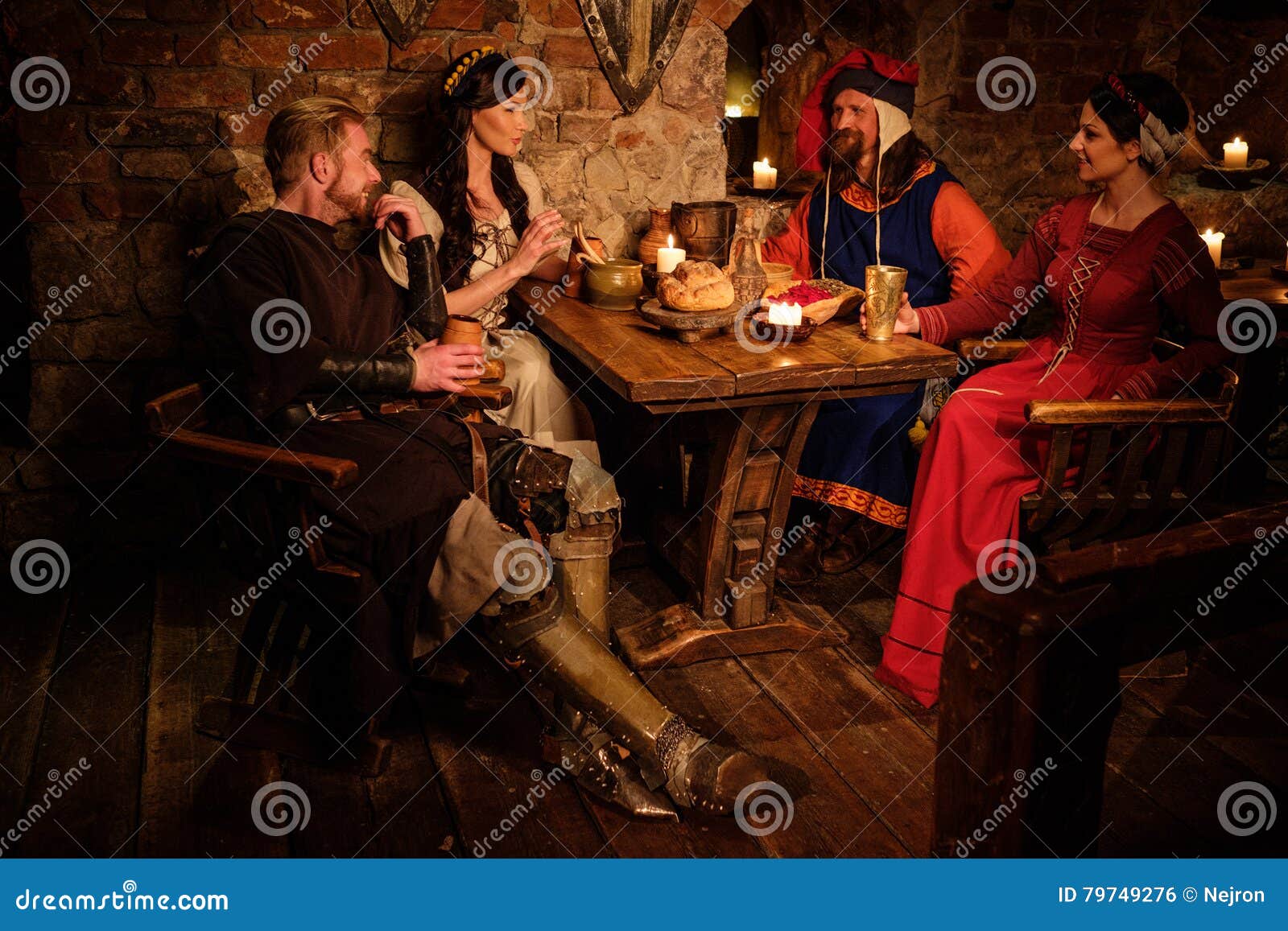 Medieval People As A Royalty Persons In Vintage Clothing On Dark ...