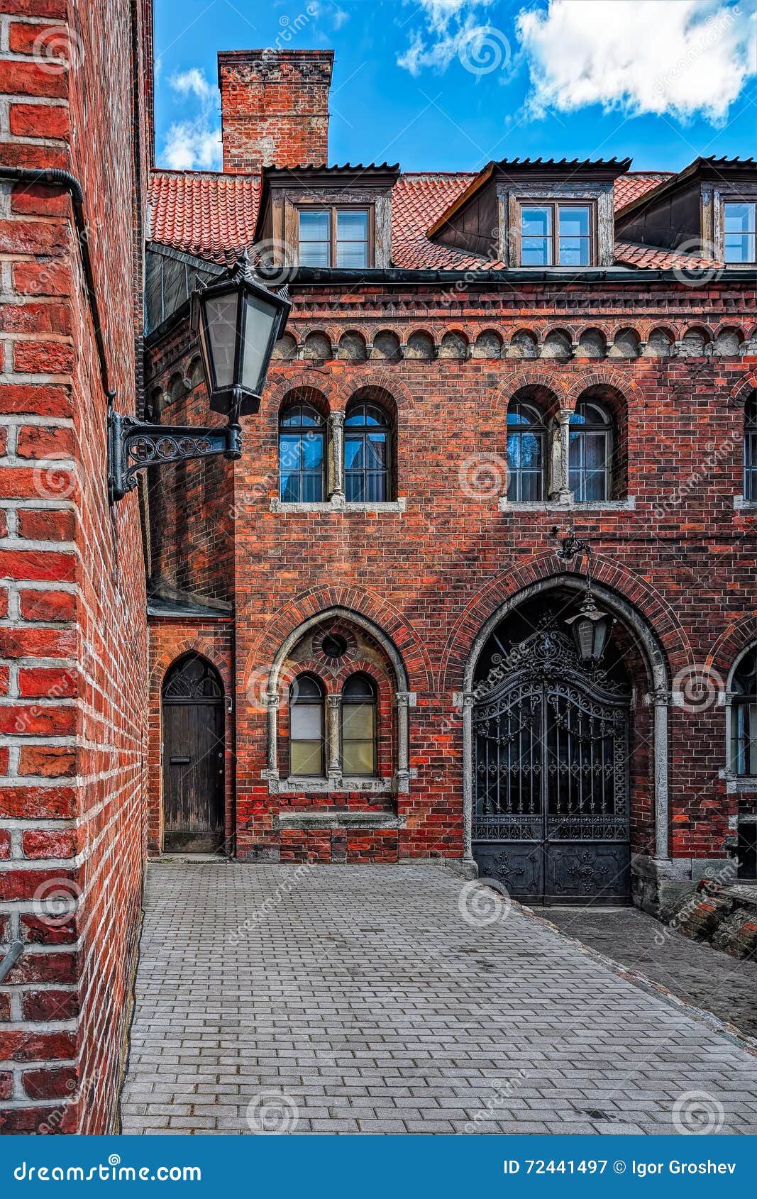 Medieval red brick house stock image. Image of people - 72441497