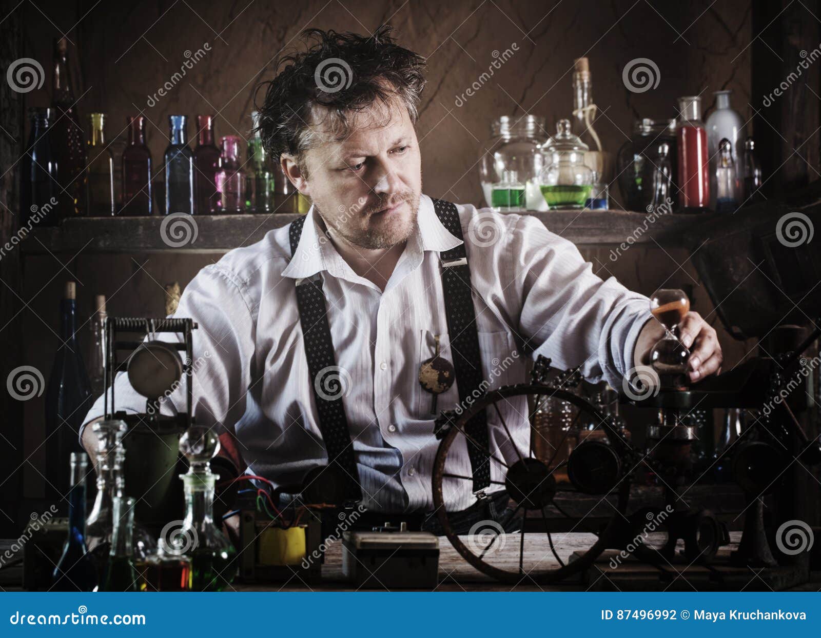 Medieval Scientist Reading Book in Laboratory Stock Photo - Image of ...