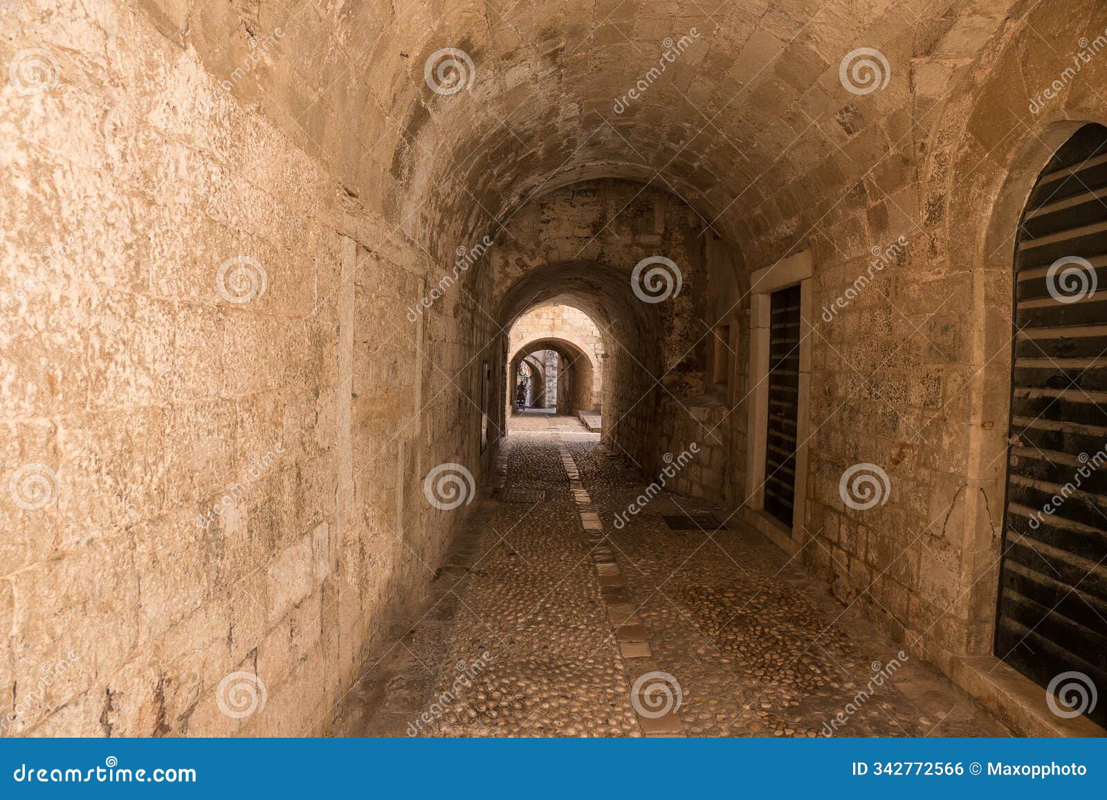 Medieval Stone Arched Corridor with a Stone Floor Stock Photo - Image ...