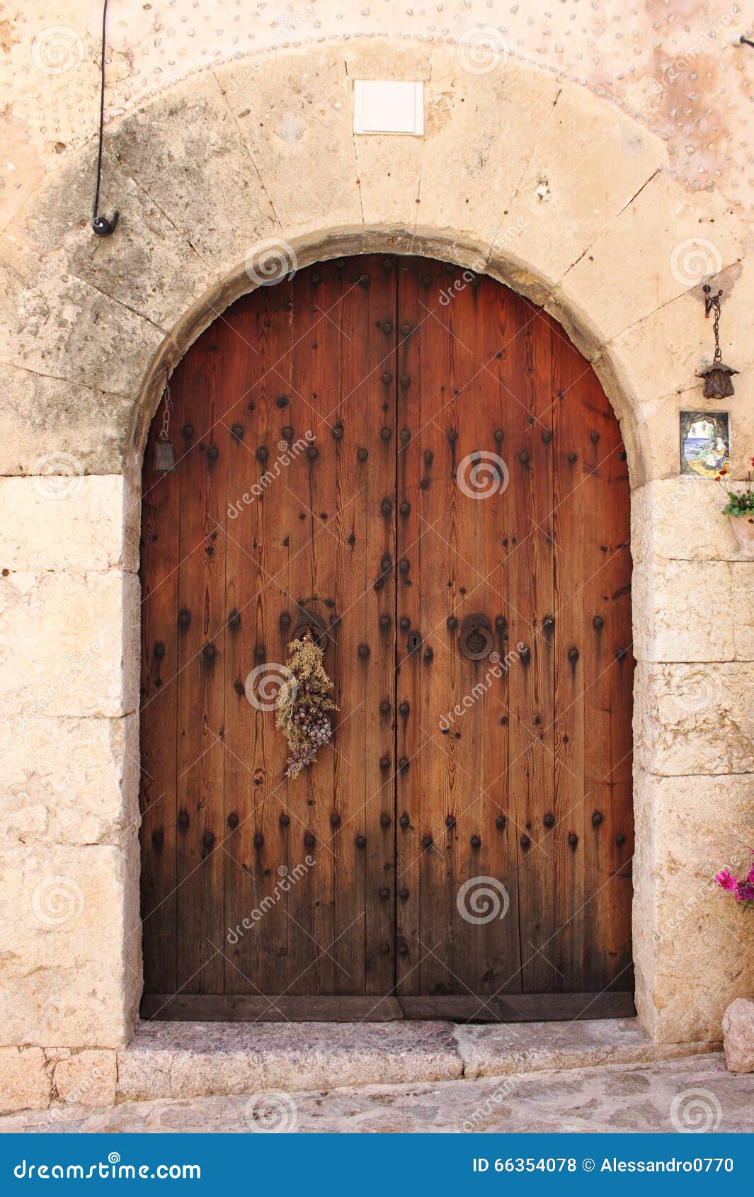 Medieval style front door stock photo. Image of spain - 66354078