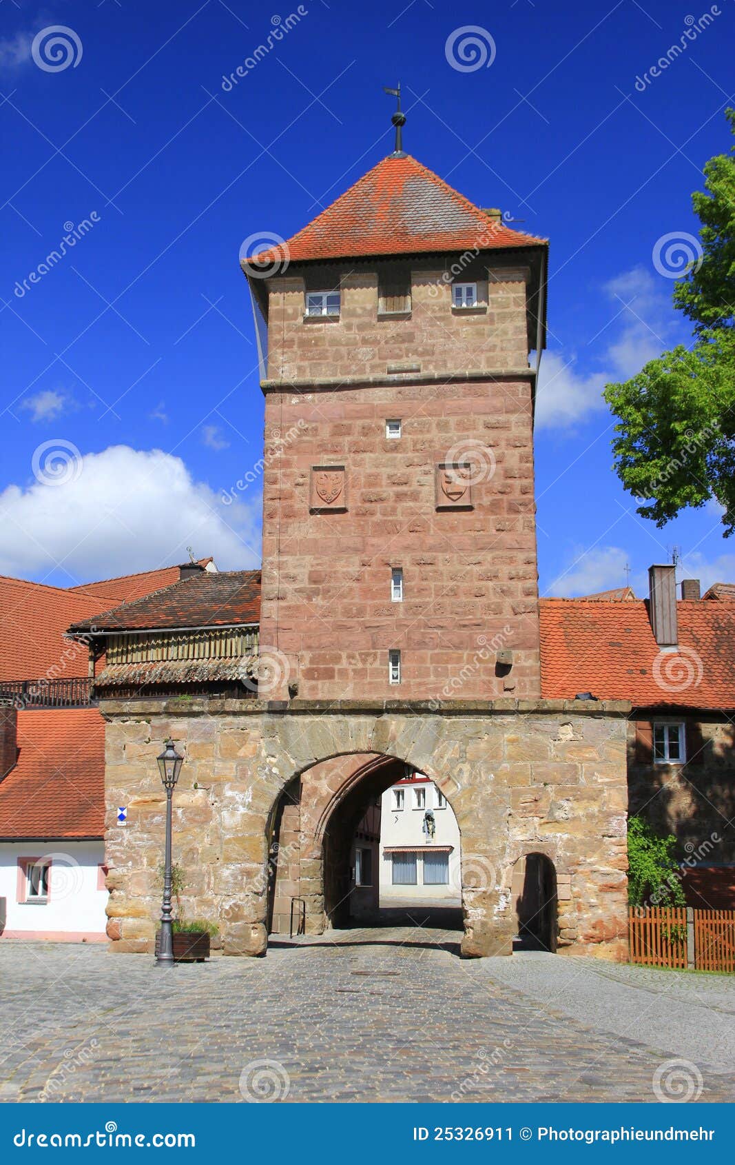 Medieval town gate stock image. Image of clock, interest - 25326911