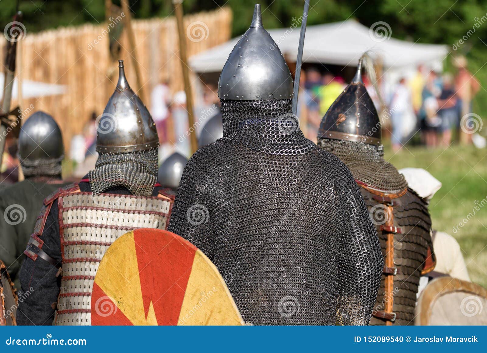 Medieval warriors in armor stock photo. Image of armor - 152089540