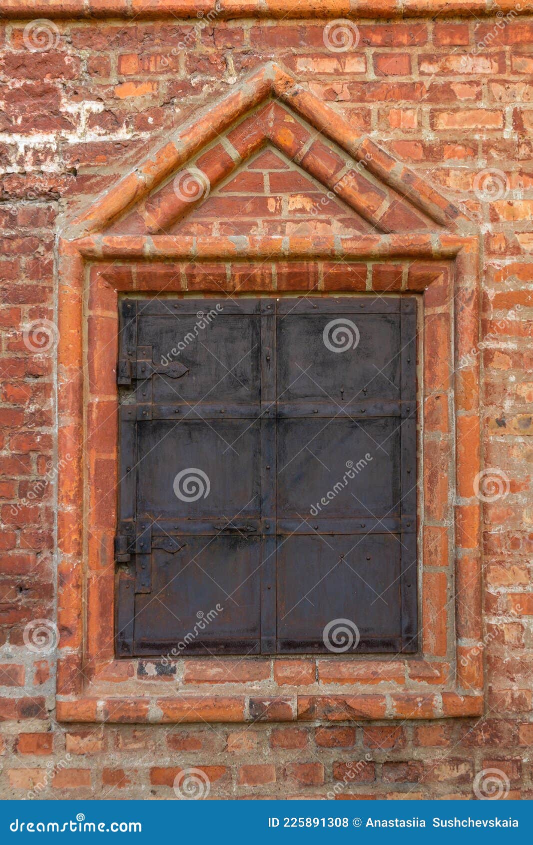 Medieval Window with Iron Shutters in a Brick Wall Stock Photo - Image ...