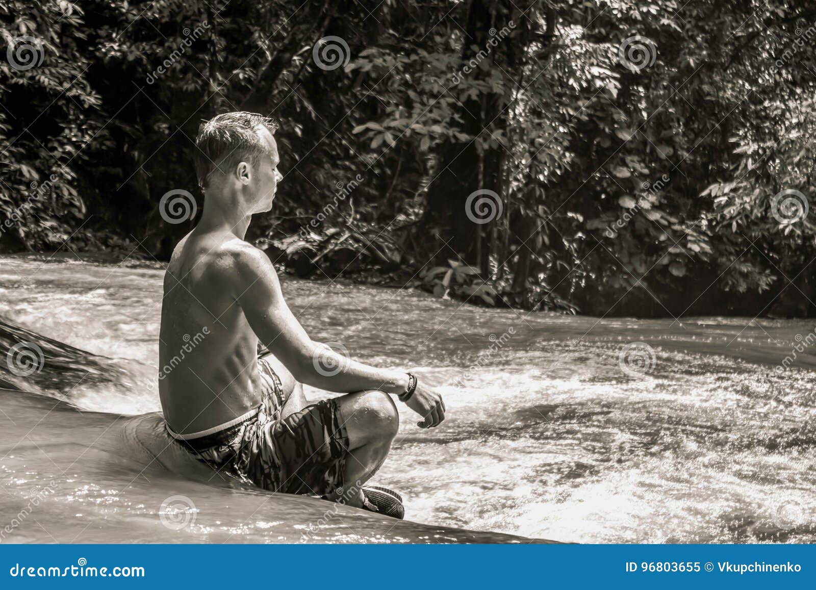 Meditating guy stock image. Image of buddhism, jungle - 96803655