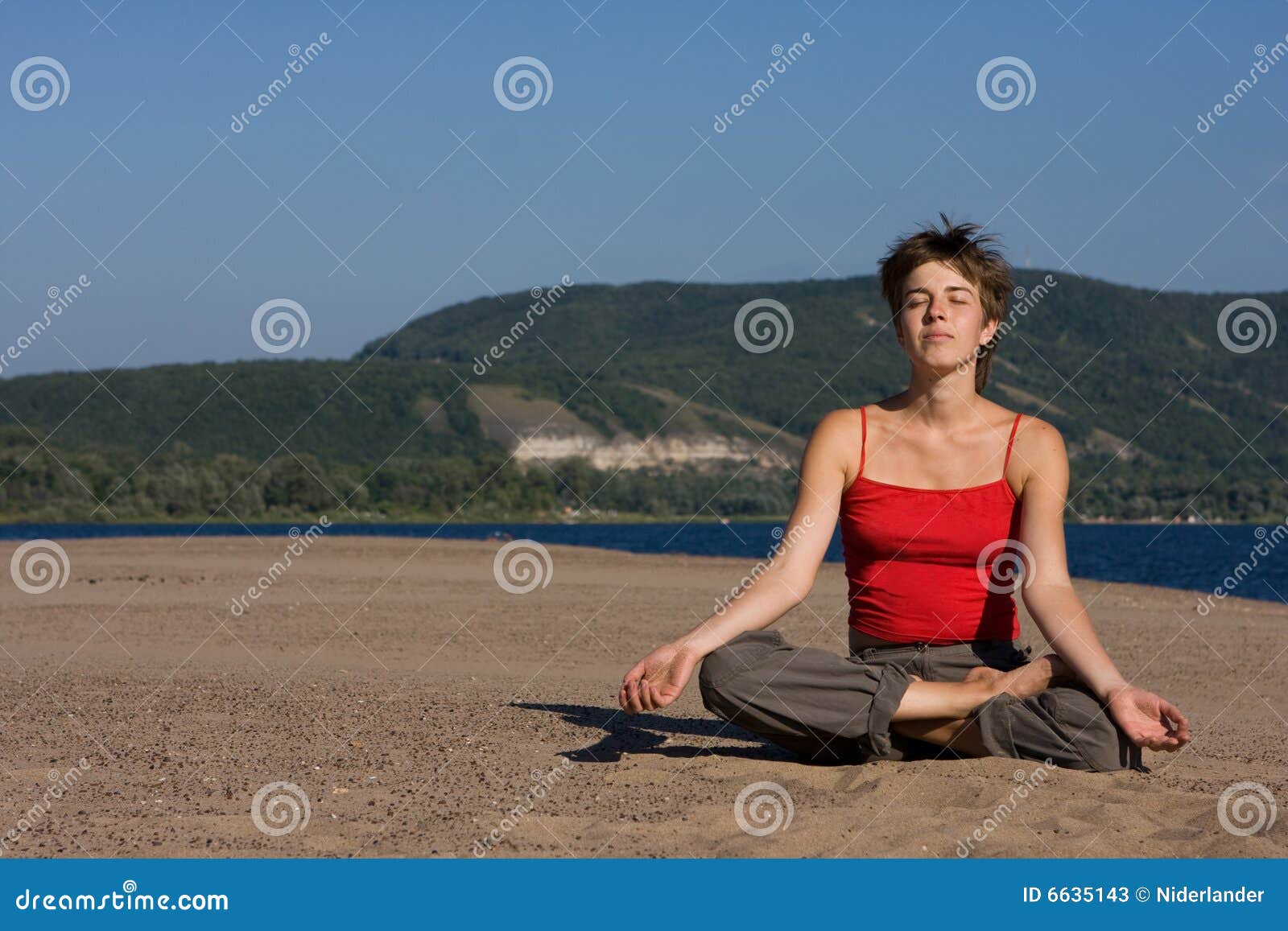 Meditation on the sand stock image. Image of person, female - 6635143