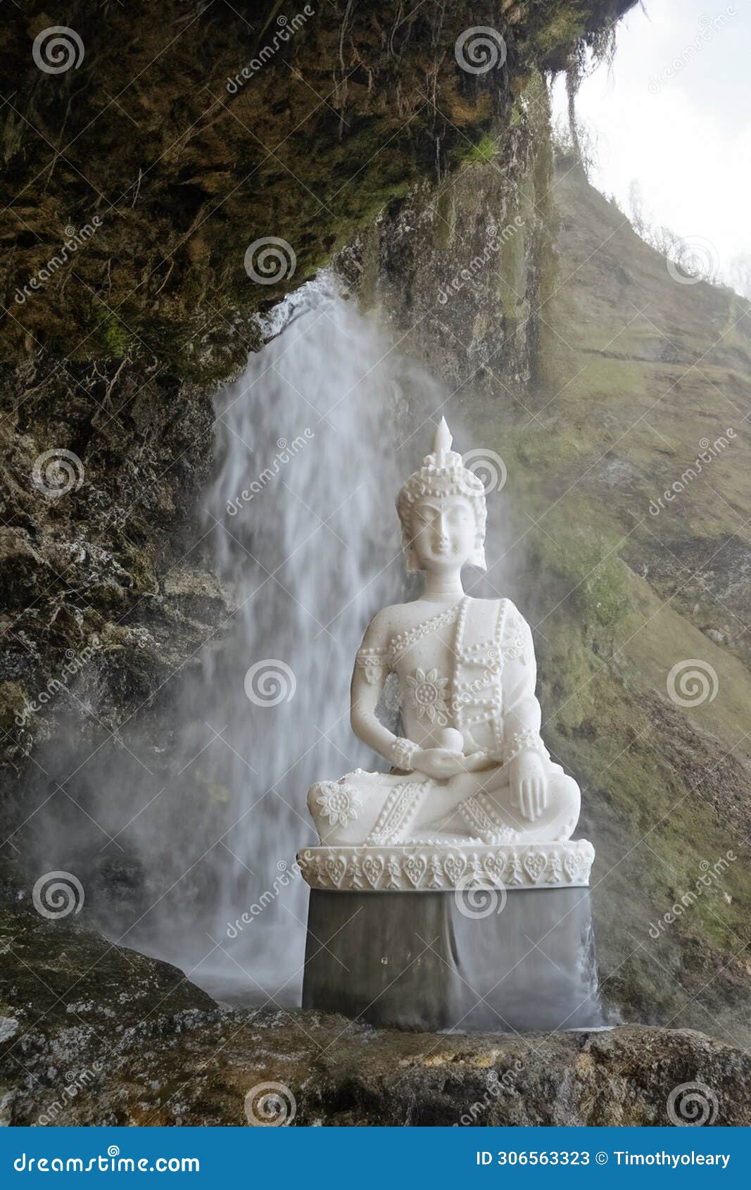 Meditative Buddha Statue with a Waterfall and Beautiful Natural Setting ...