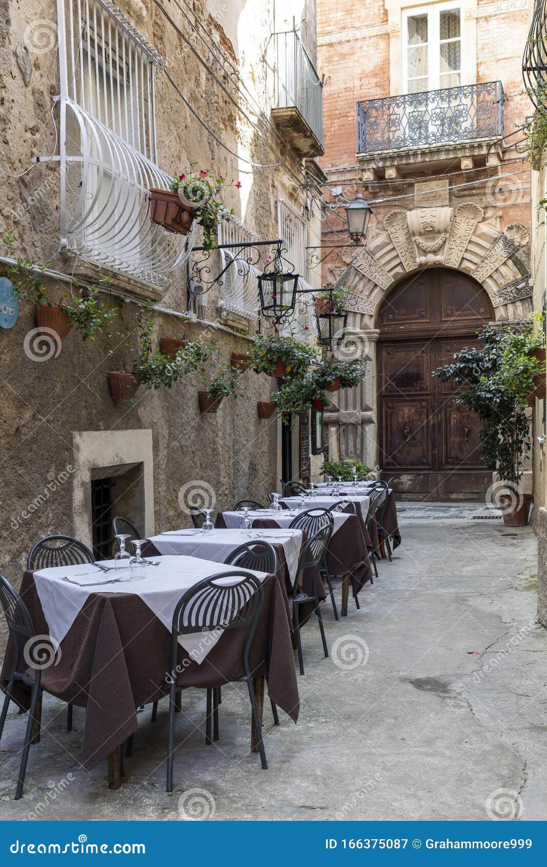 Mediterranean restaurant stock image. Image of tables - 166375087