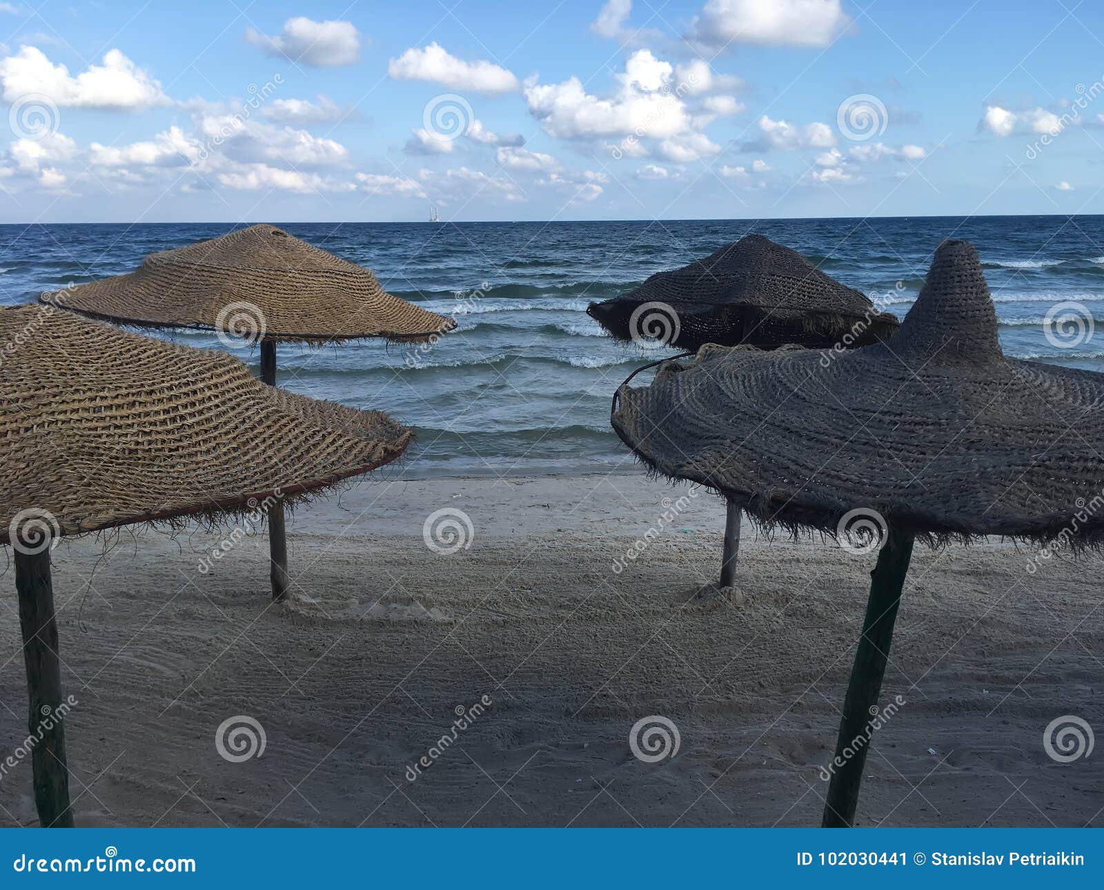 Mediterranean Sea, Beach, Wicker Umbrellas and Waves Stock Image ...